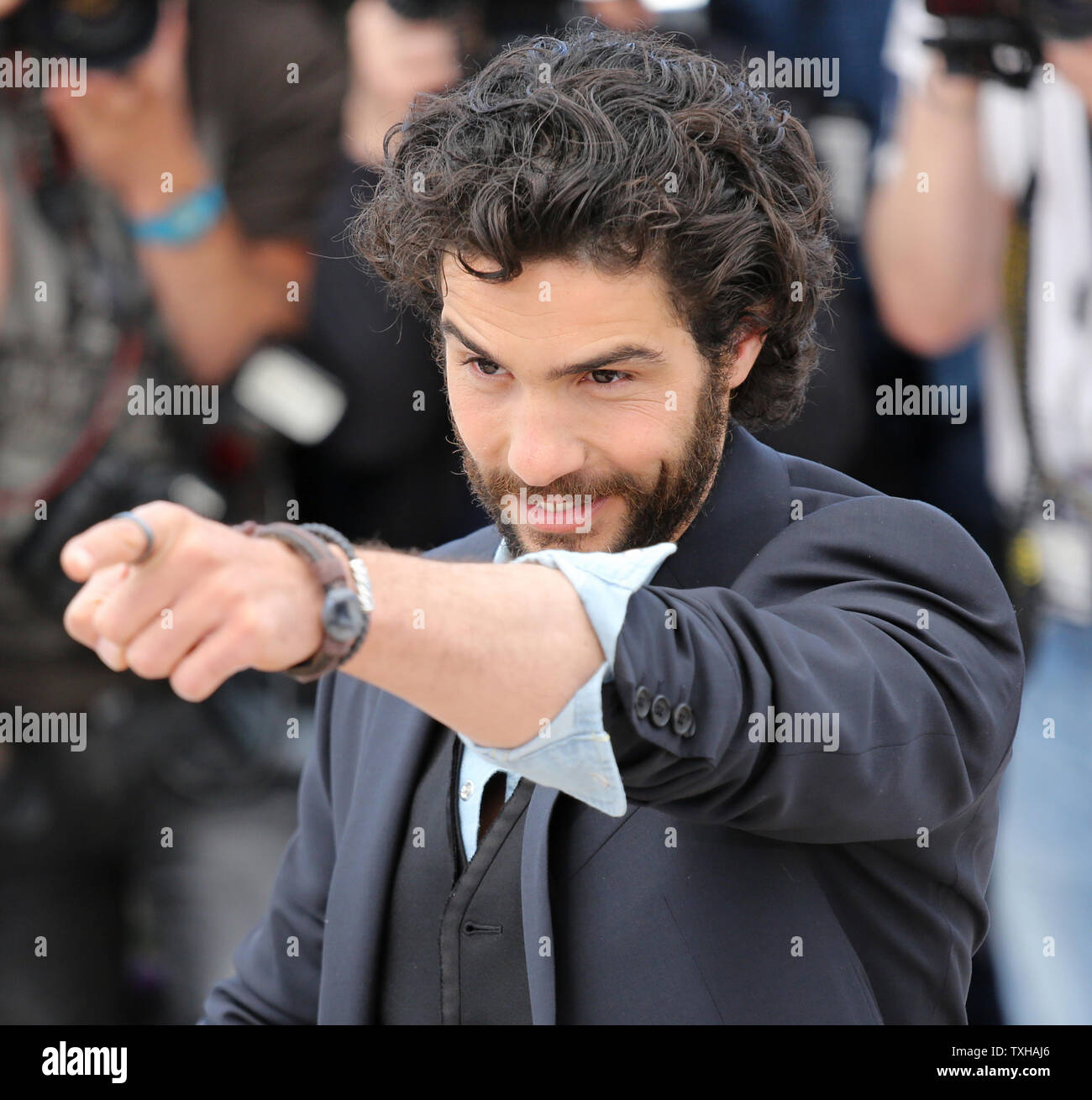 Tahar Rahim arrives at a photocall for the film "Le Passe (The Past ...