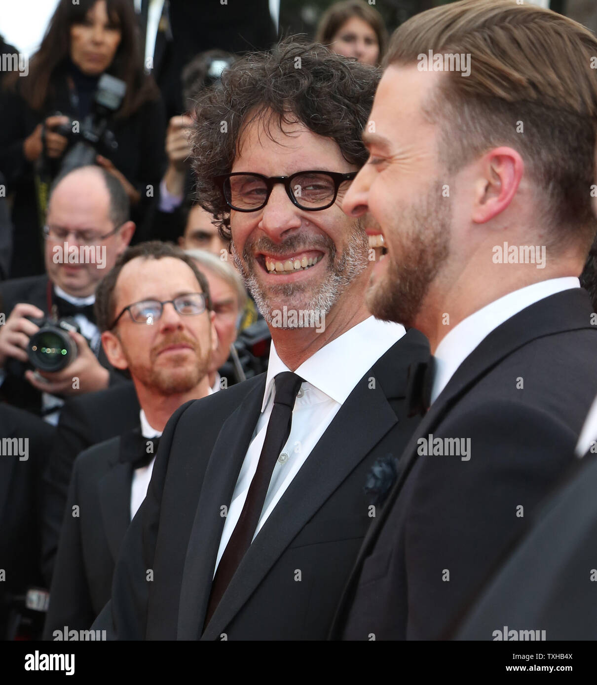 Joel Coen (L) and Justin Timberlake share a laugh on the red carpet ...