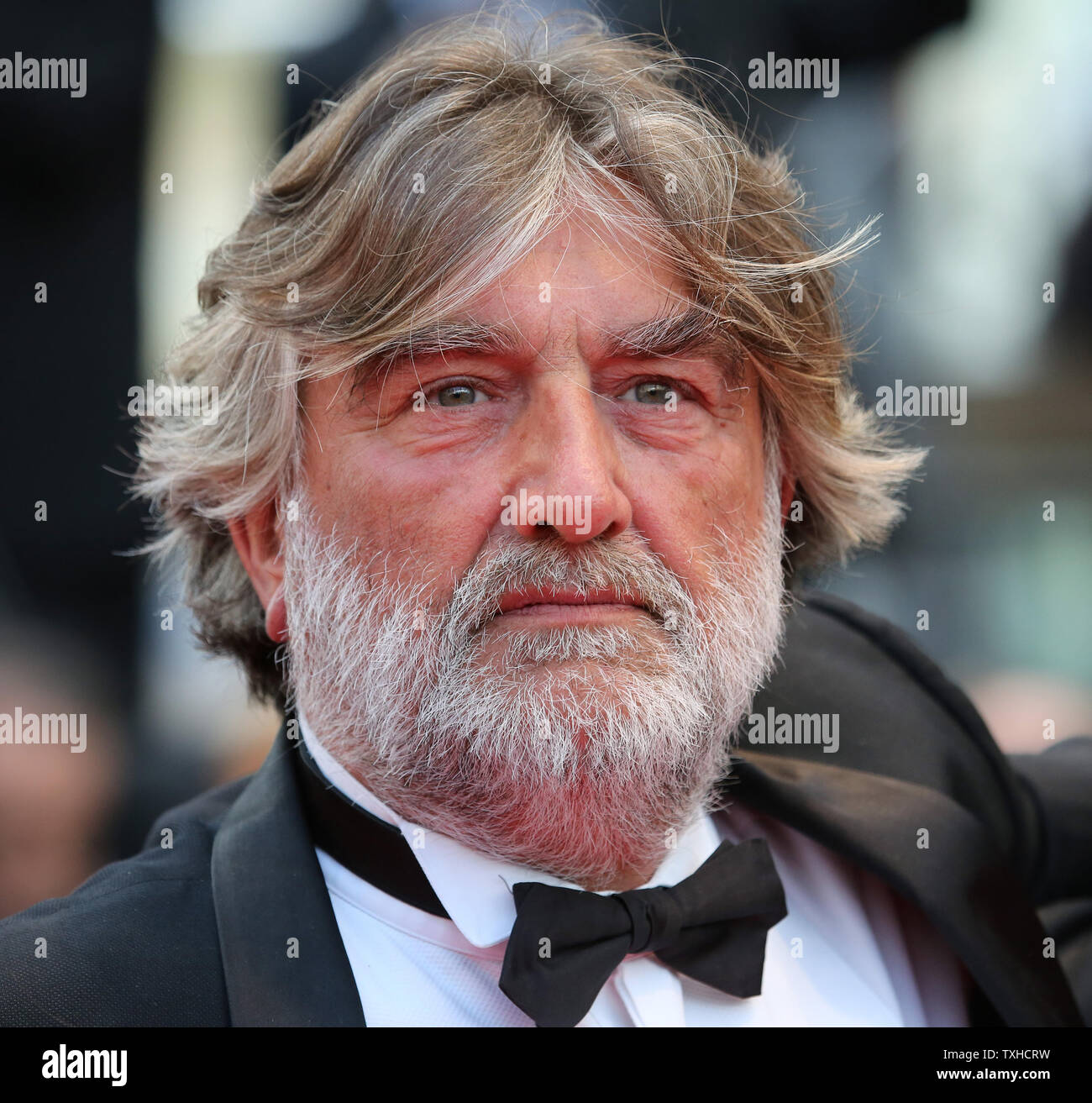 Pierre Ange Le Pogam arrives on the red carpet before the screening of ...