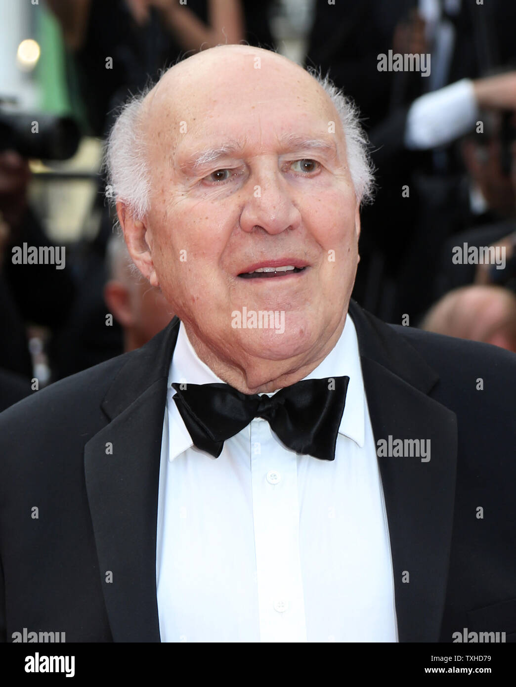 Michel Piccoli arrives on the red carpet before the screening of the ...
