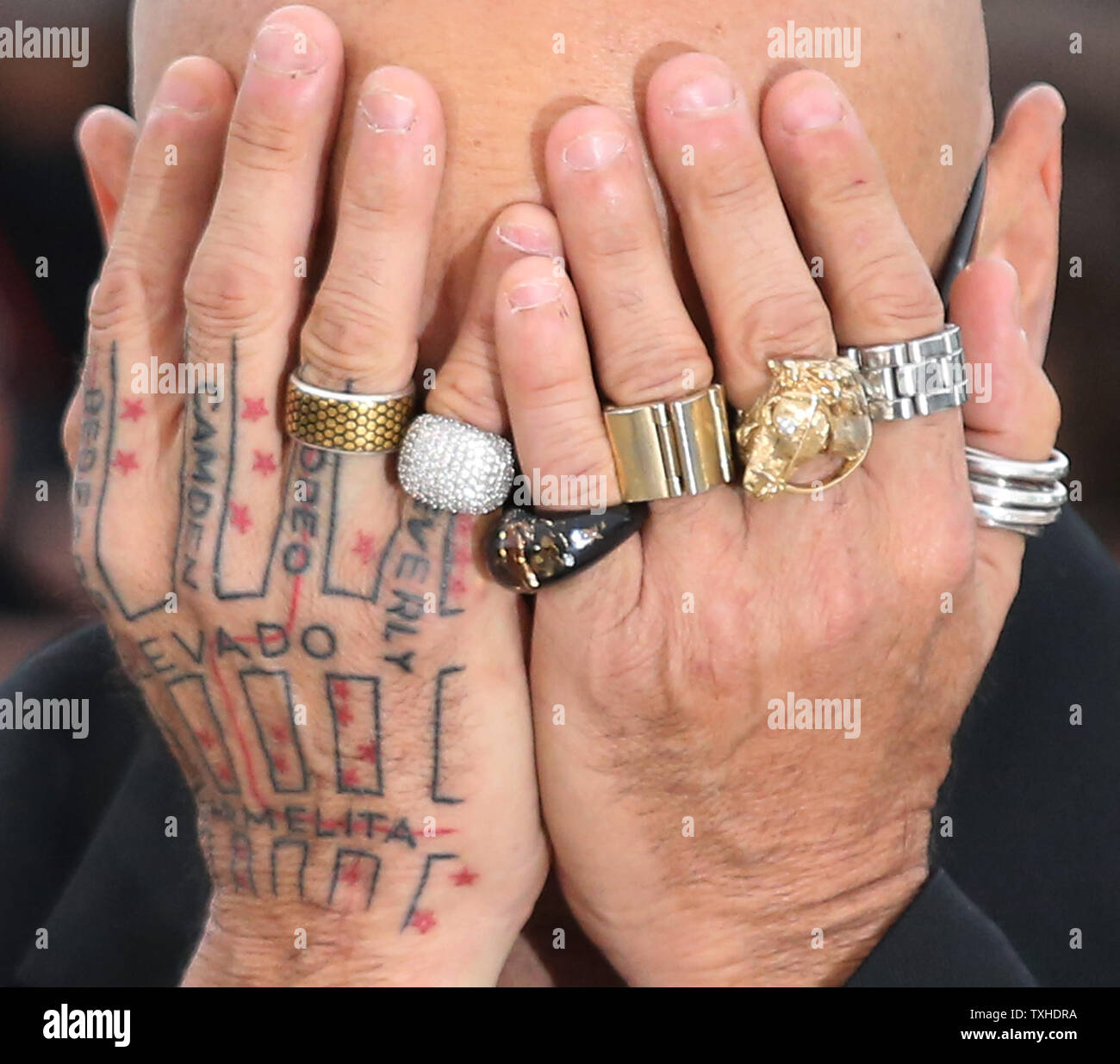 The hands of actor Bruce Wagner are seen at a photo call for the film ...