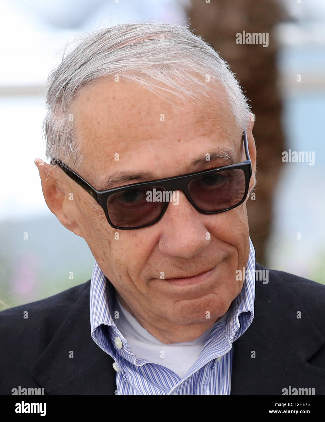 Andre Techine arrives at a photo call for the film "L'Homme qu'on ...