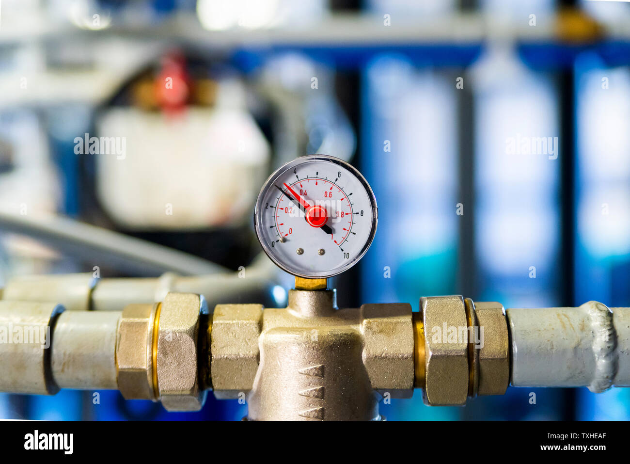 The equipment of the boiler-house, valves, tubes, pressure gauges ...