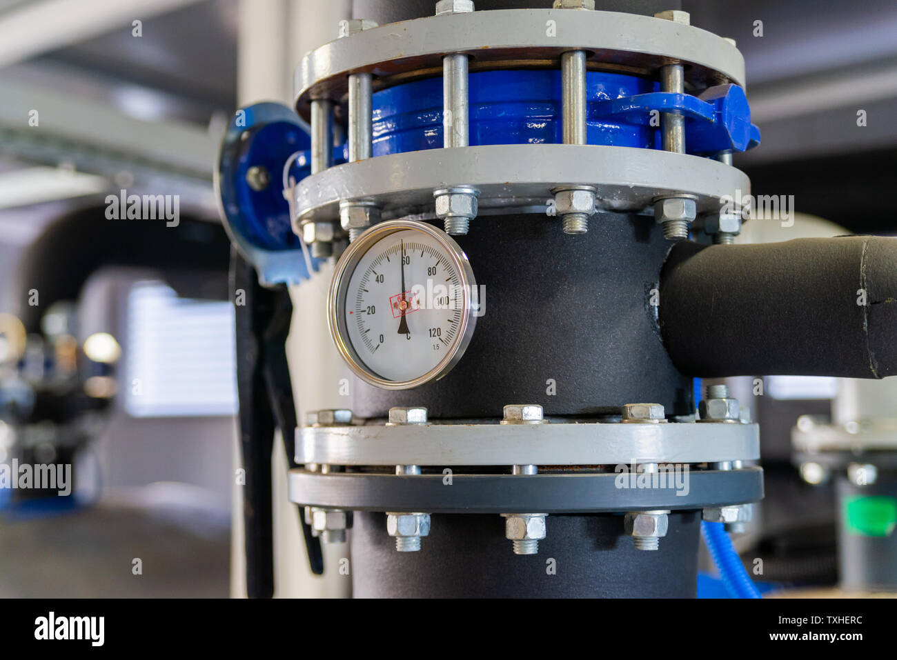 The equipment of the boiler-house, valves, tubes, pressure gauges ...