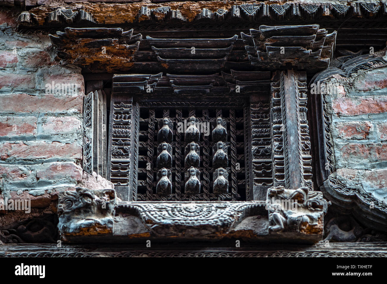 Peacock window in Badgang, Nepal Stock Photo - Alamy