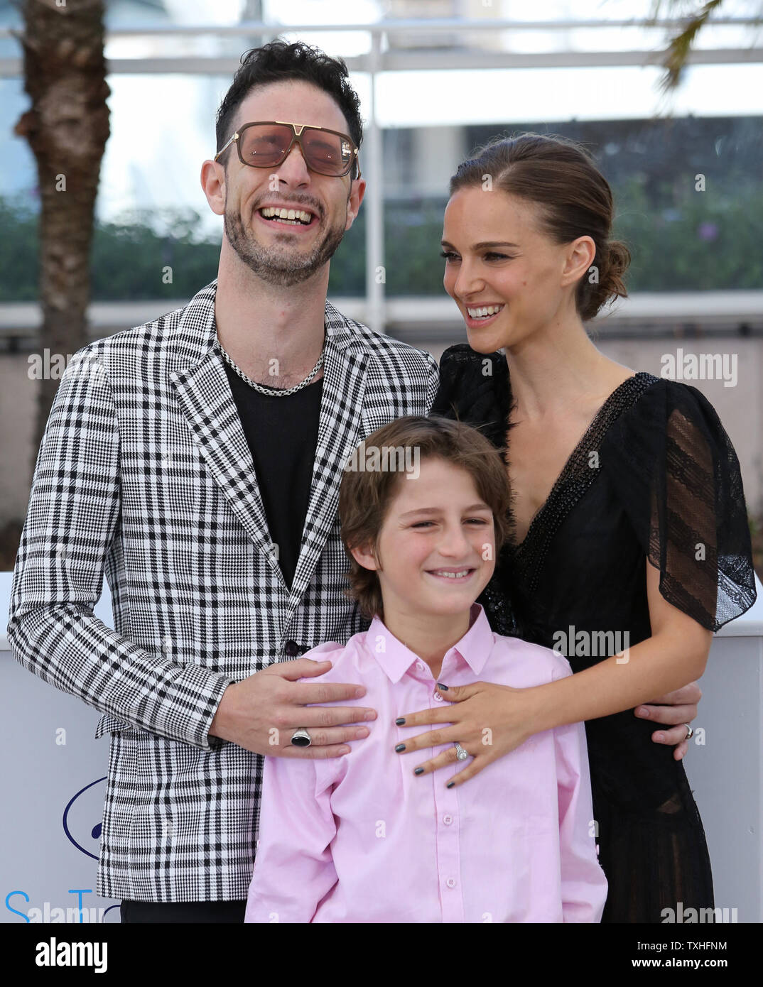 Gilad Kahana (L), Amir Tessler (C) and Natalie Portman arrive at a ...