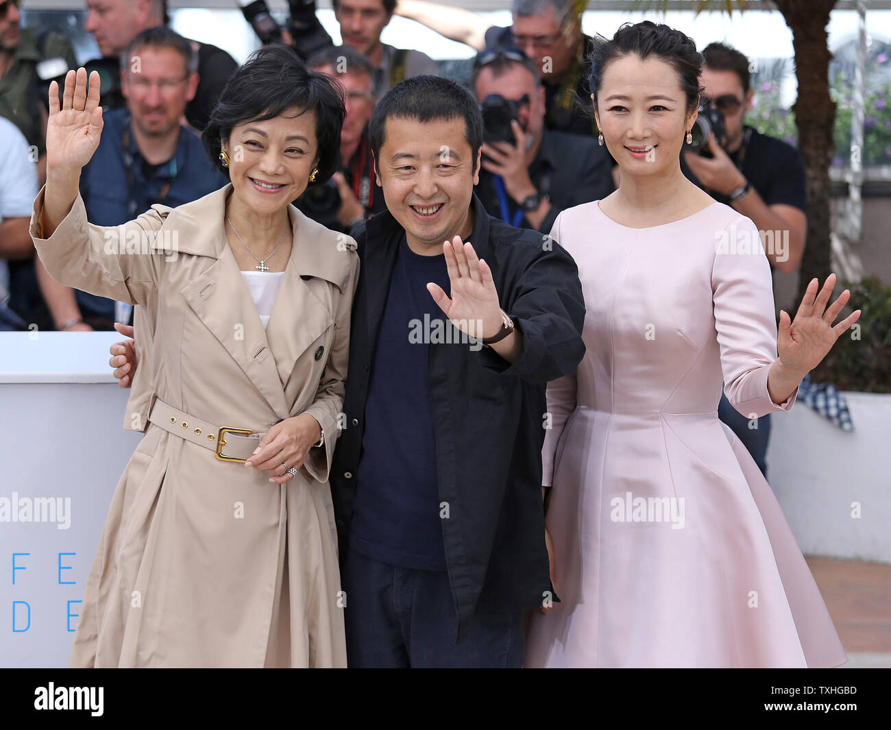 Sylvia Chang (L), Zhang-Ke Jia (C) and Tao Zhao arrive at a photocall for the film "Shan He Gu ...