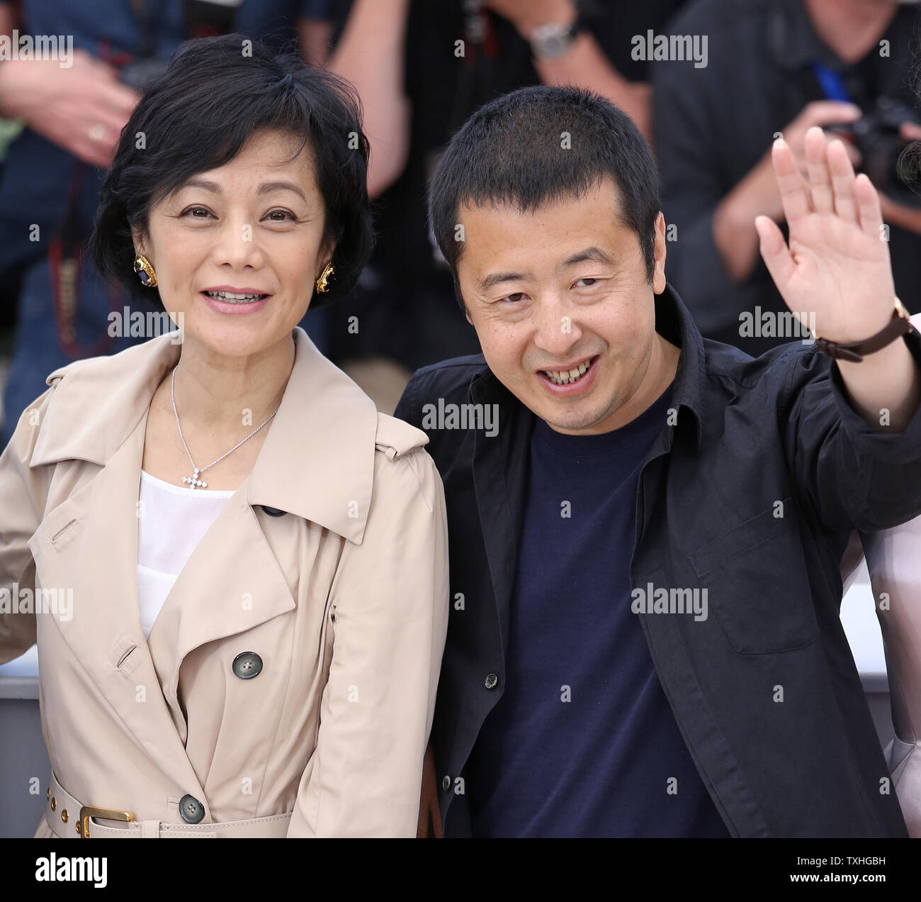 Sylvia Chang (L) and Zhang-Ke Jia arrive at a photocall for the film "Shan He Gu Ren (Mountains ...