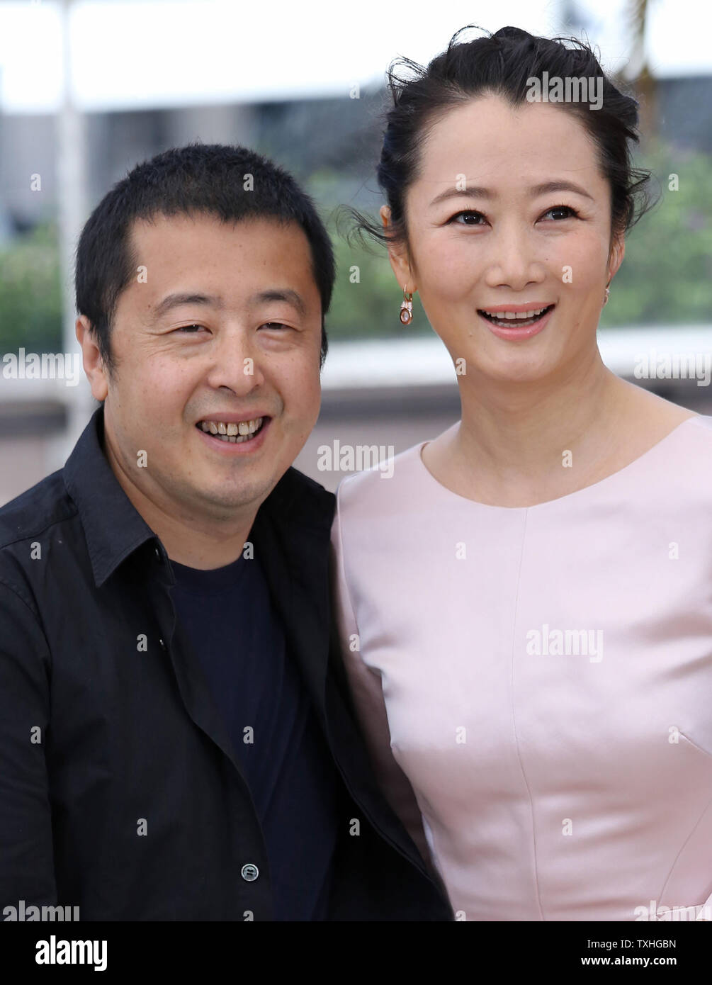 Zhang-Ke Jia (L) and Tao Zhao arrive at a photocall for the film "Shan He Gu Ren (Mountains May ...