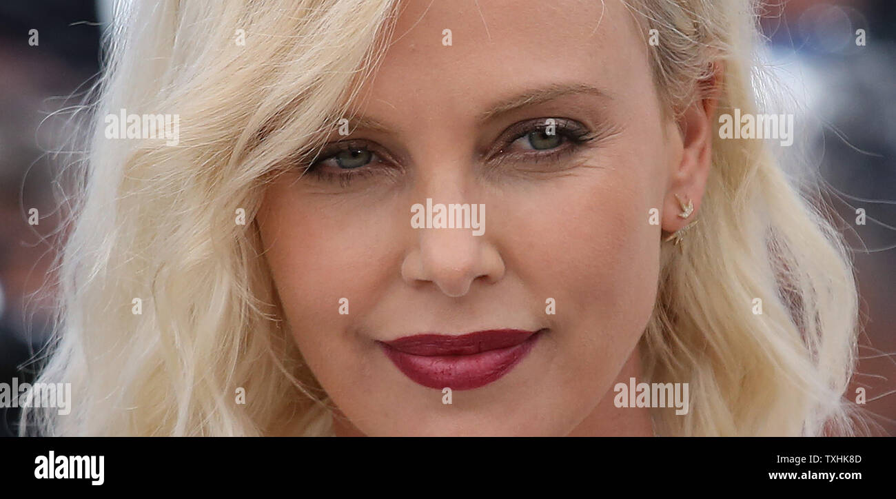 Charlize Theron arrives at a photocall for the film "The Last Face ...