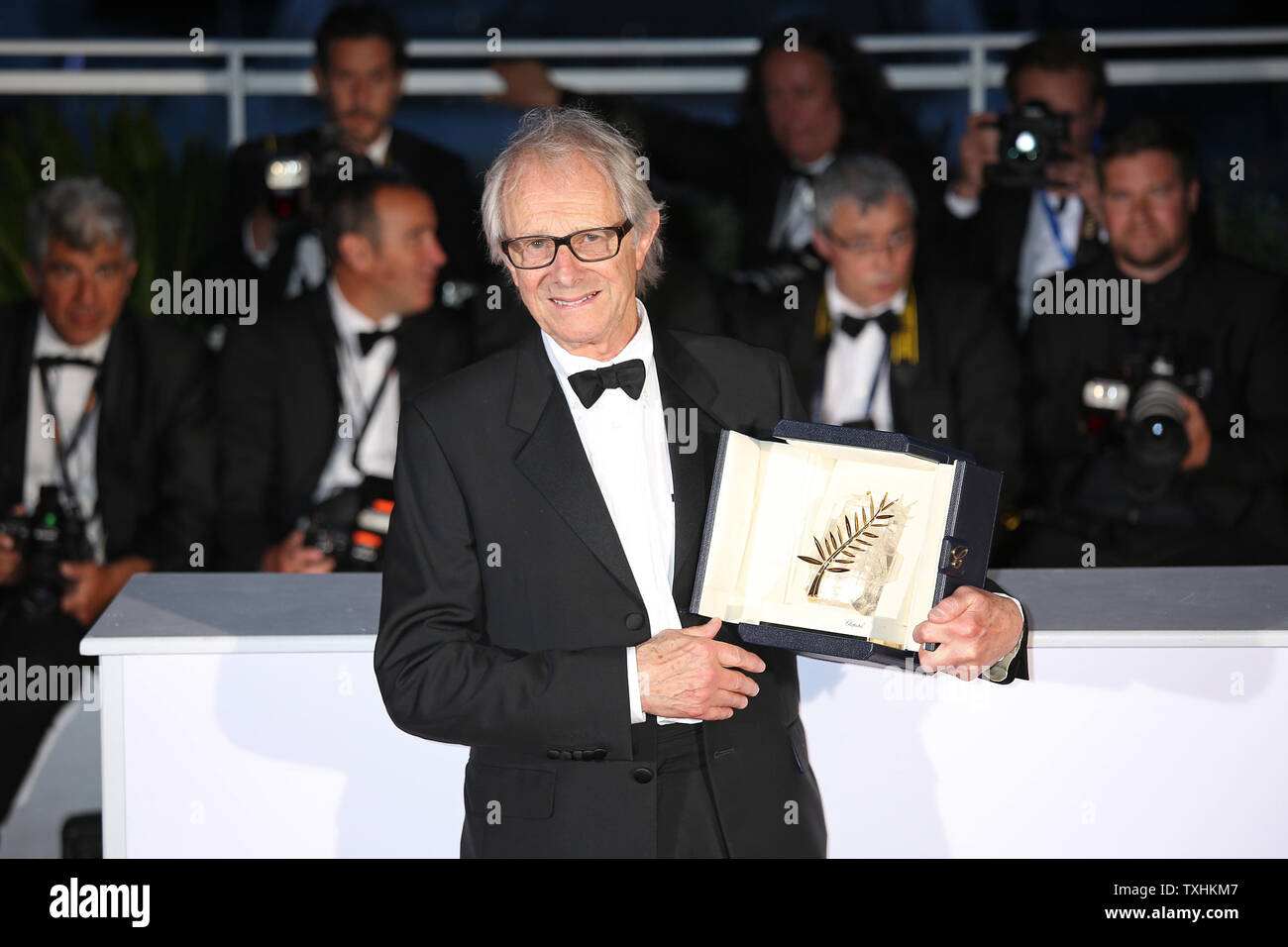 Ken Loach arrives at the award photo call after receiving the "Palme d ...
