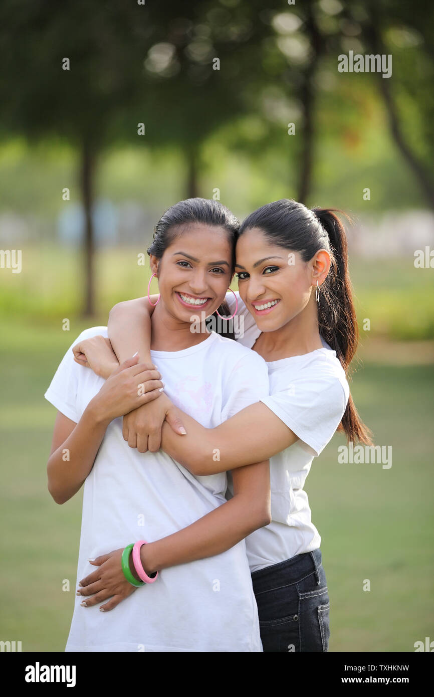 Portrait of two friends smiling Stock Photo - Alamy