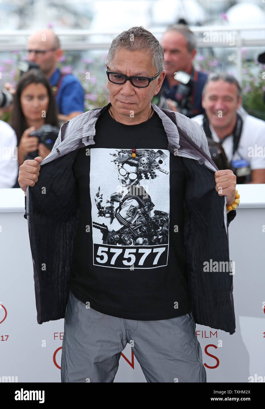 Takashi Miike arrives at a photocall for the film "Blade of the ...
