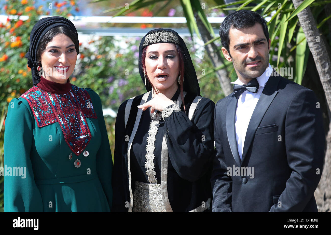 Soudabeh Beizaee (L), Nasim Adabi (C) and Mohammad Akhlaghirad arrive ...
