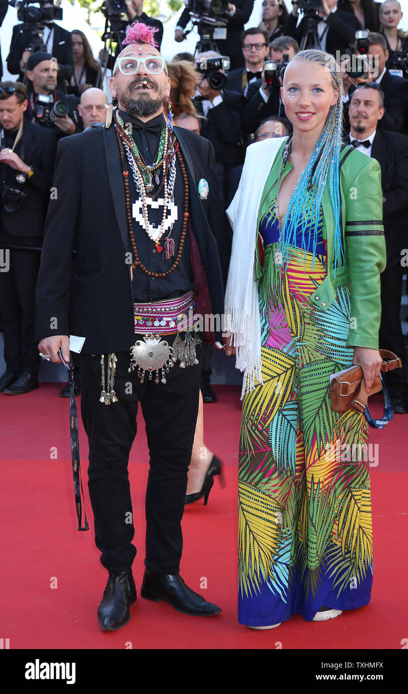 Georg Georgi (L) and guest arrive on the red carpet before the ...