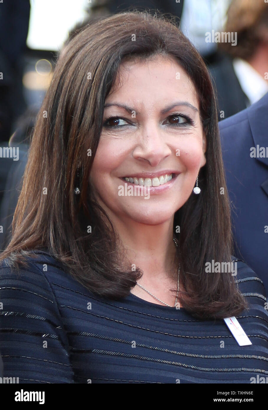 Paris Mayor Anne Hidalgo arrives on the red carpet before the screening ...