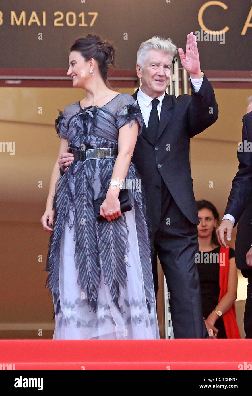 Emily Stofle (L) and David Lynch arrive on the red carpet before the ...