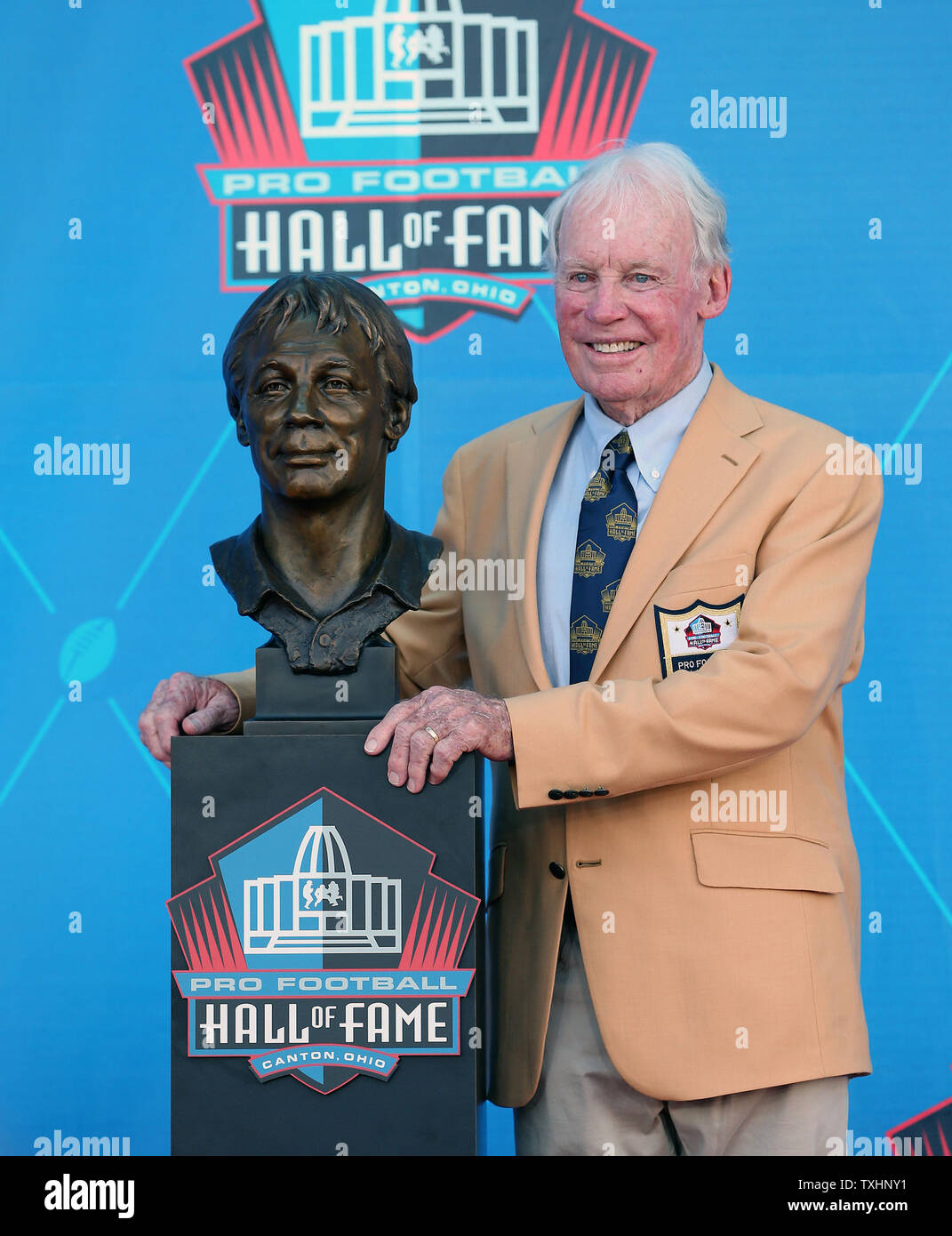 Bobby Beathard stands with his bust after his enshrinement into the Pro ...