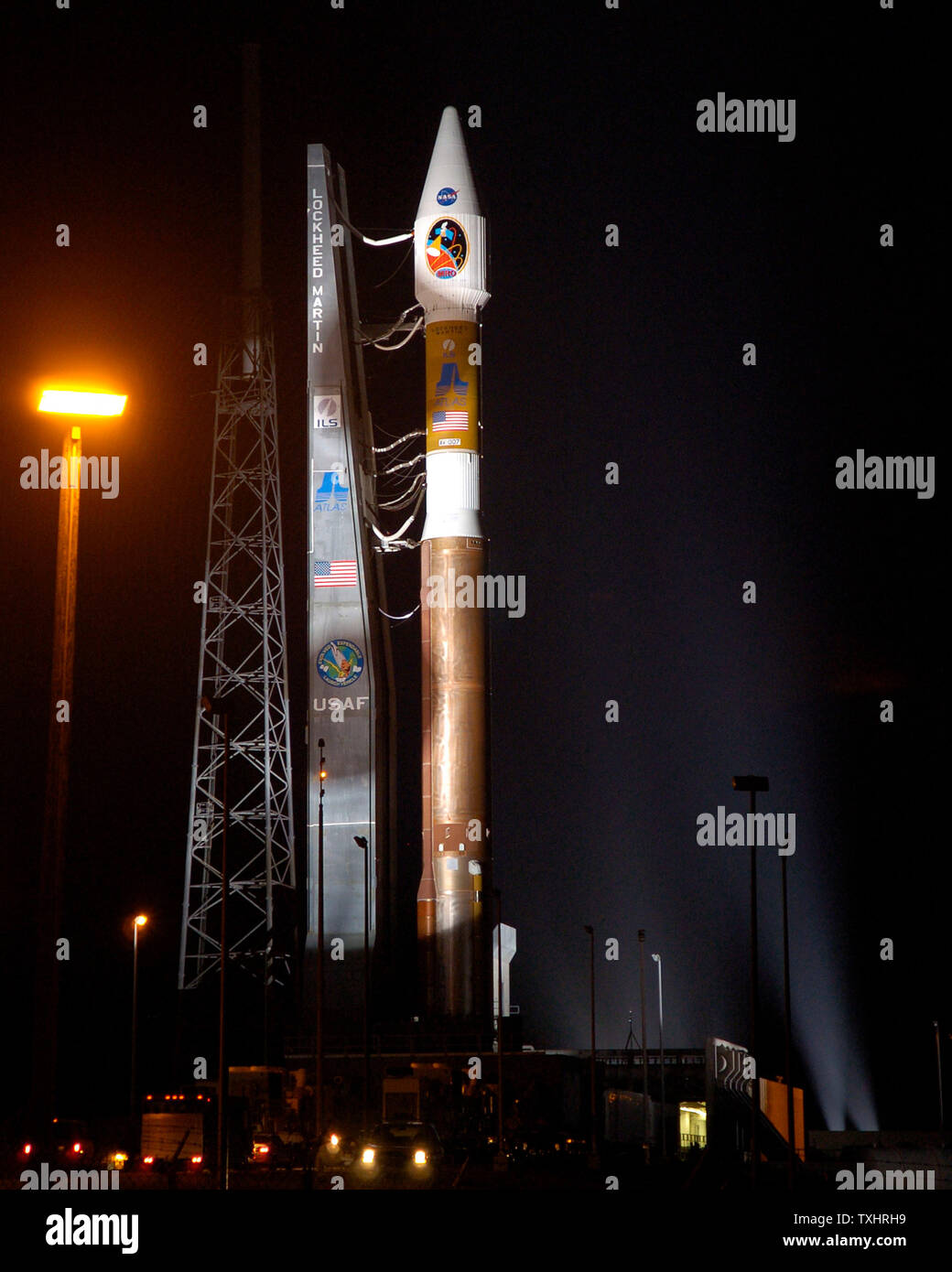 An Atlas V rocket rolls to Launch Complex 41 in preparation for ...