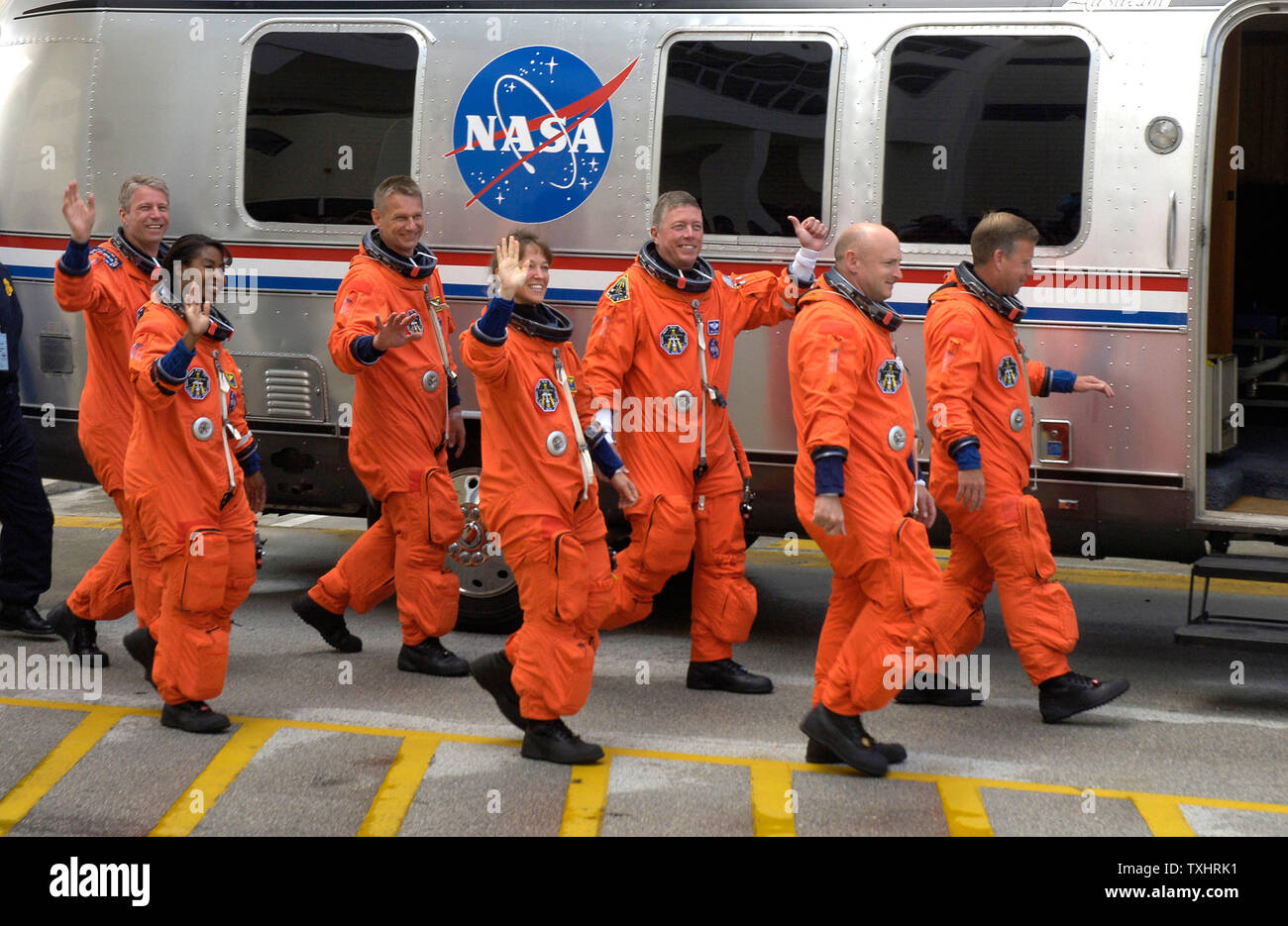 Commander of the Space Shuttle Discovery Steven Lindsey leads his ...