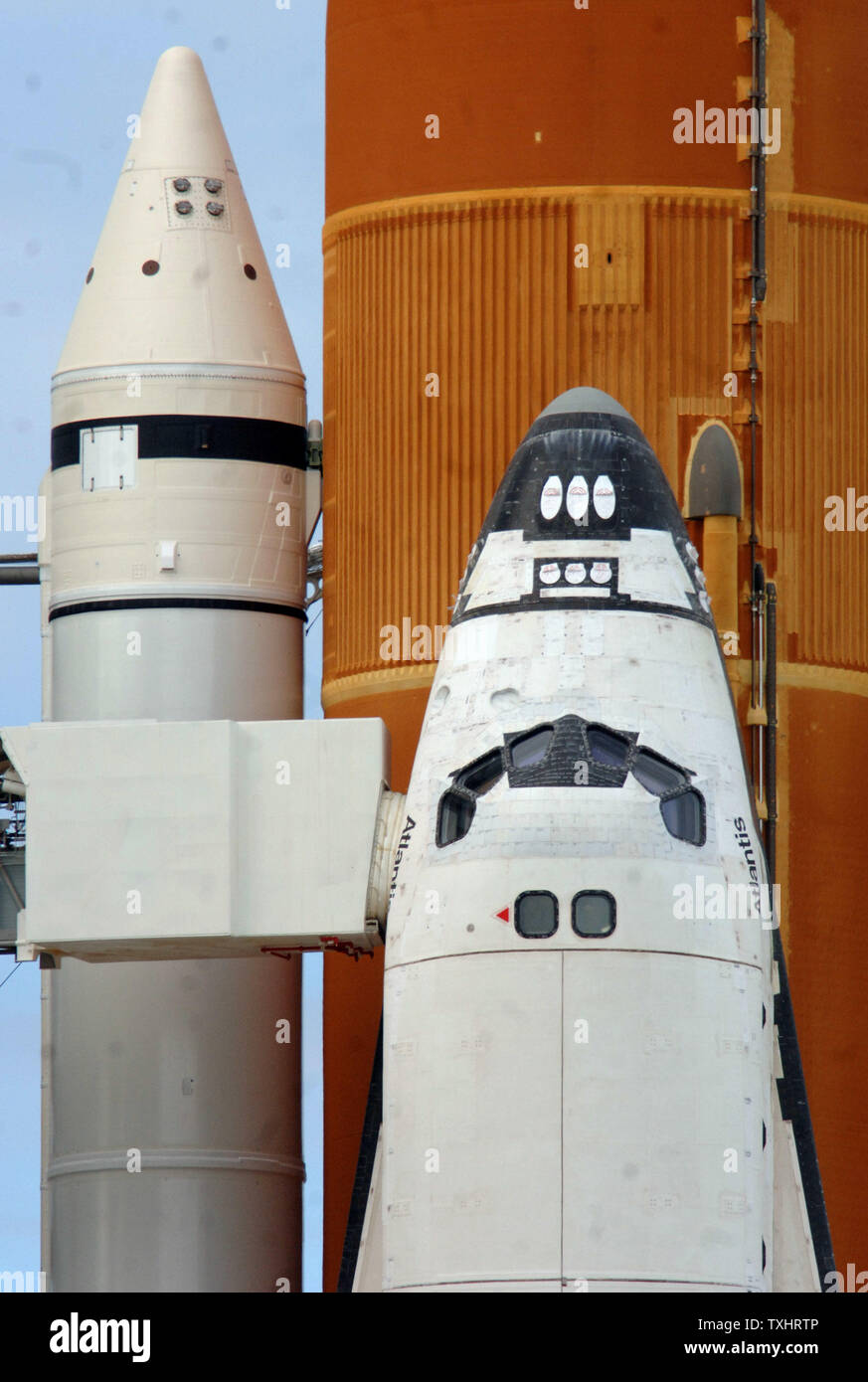 Space Shuttle Atlantis becomes visible as the Rotating Service ...