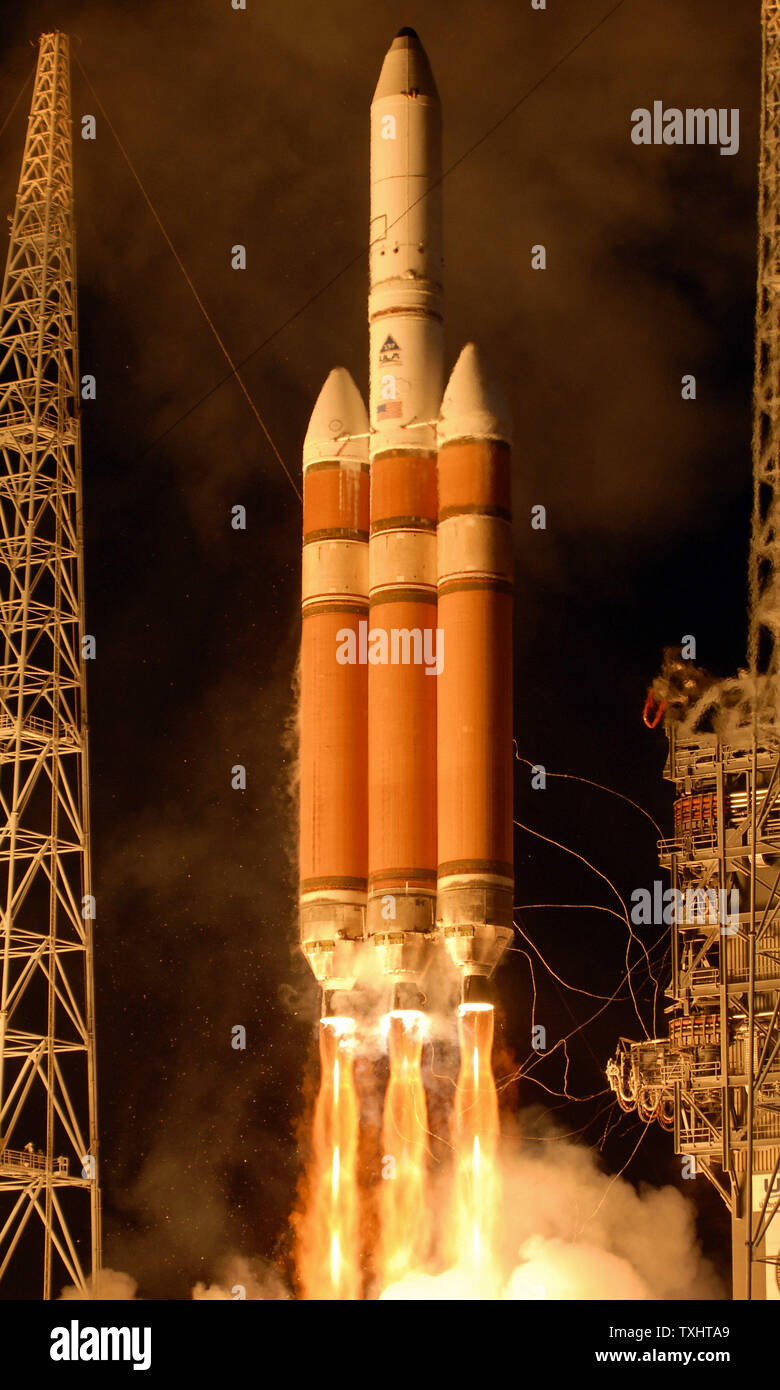 A Boeing Delta IV "Heavy" rocket climbs from launch pad 37B at 9:47 PM ...