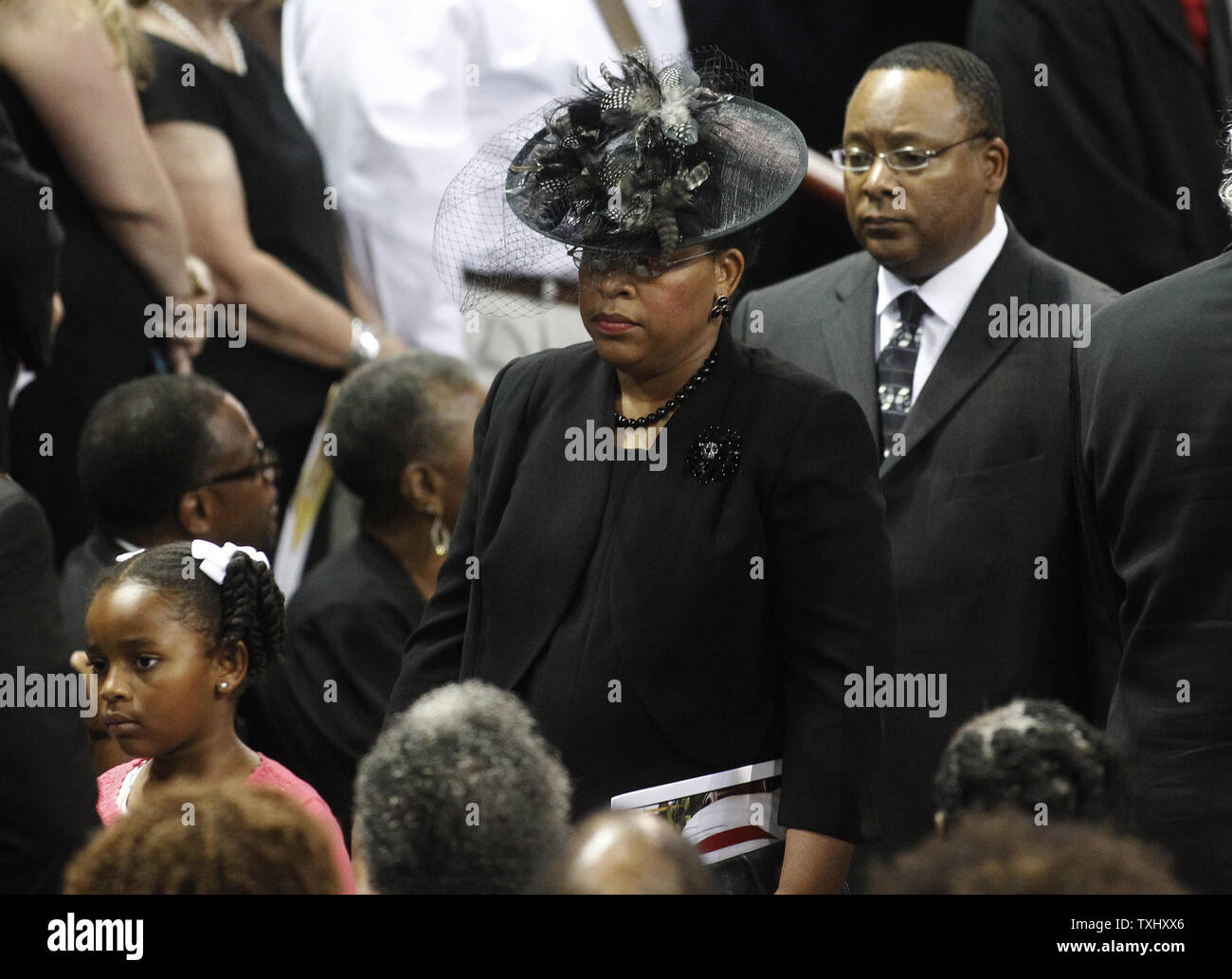Jennifer Pinckney (R) arrives with her family for the funeral of her ...