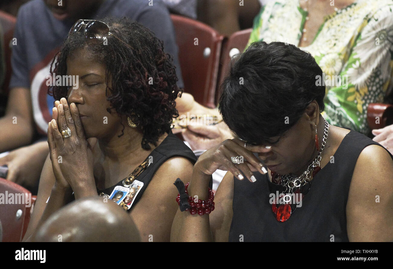 Mourners pray during the funeral of South Carolina State Senator and ...