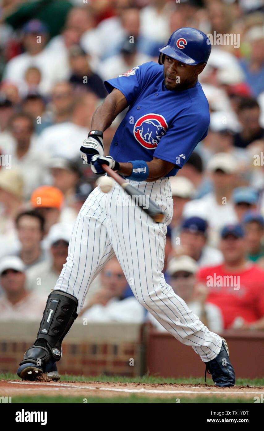Cubs center fielder Corey Patterson hits against the Red Sox. The ...