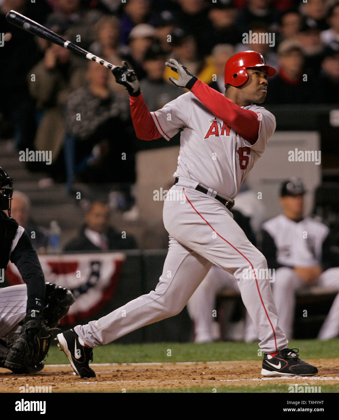 Los Angeles Angels of Anaheim's Garret Anderson follows through on his ...