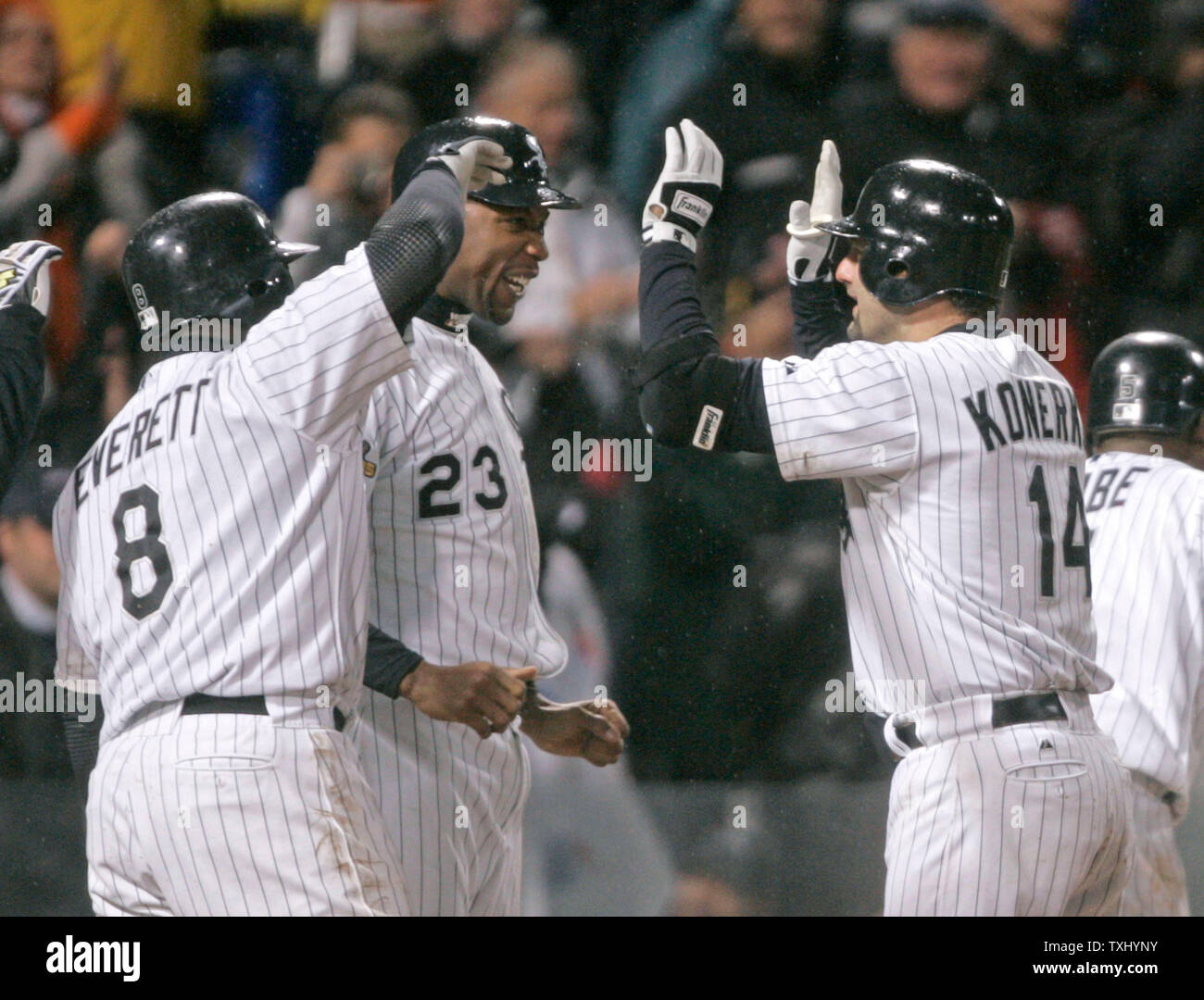 Chicago White Sox Paul Konerko, right, is congratulated by Jermaine Dye ...