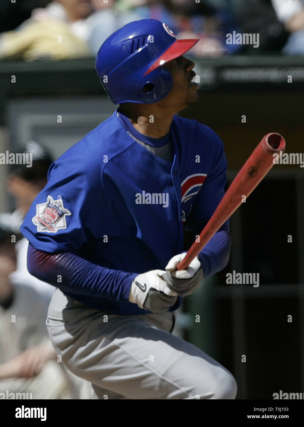 Chicago Cubs' Jacque Jones watches his two-run homer scoring Michael ...