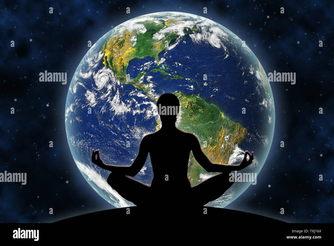 Female yoga figure against a space background and a planet Earth ...