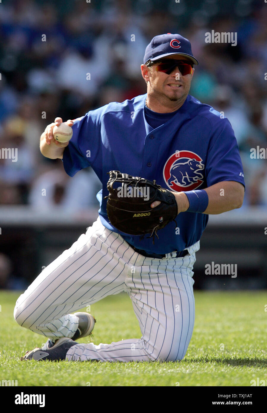 Chicago Cubs first baseman Phil Nevin (40) fields a sacrifice bunt by ...