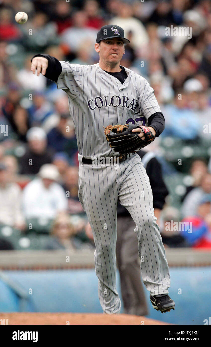 Colorado Rockies third baseman Garrett Atkins (27) throws to first ...