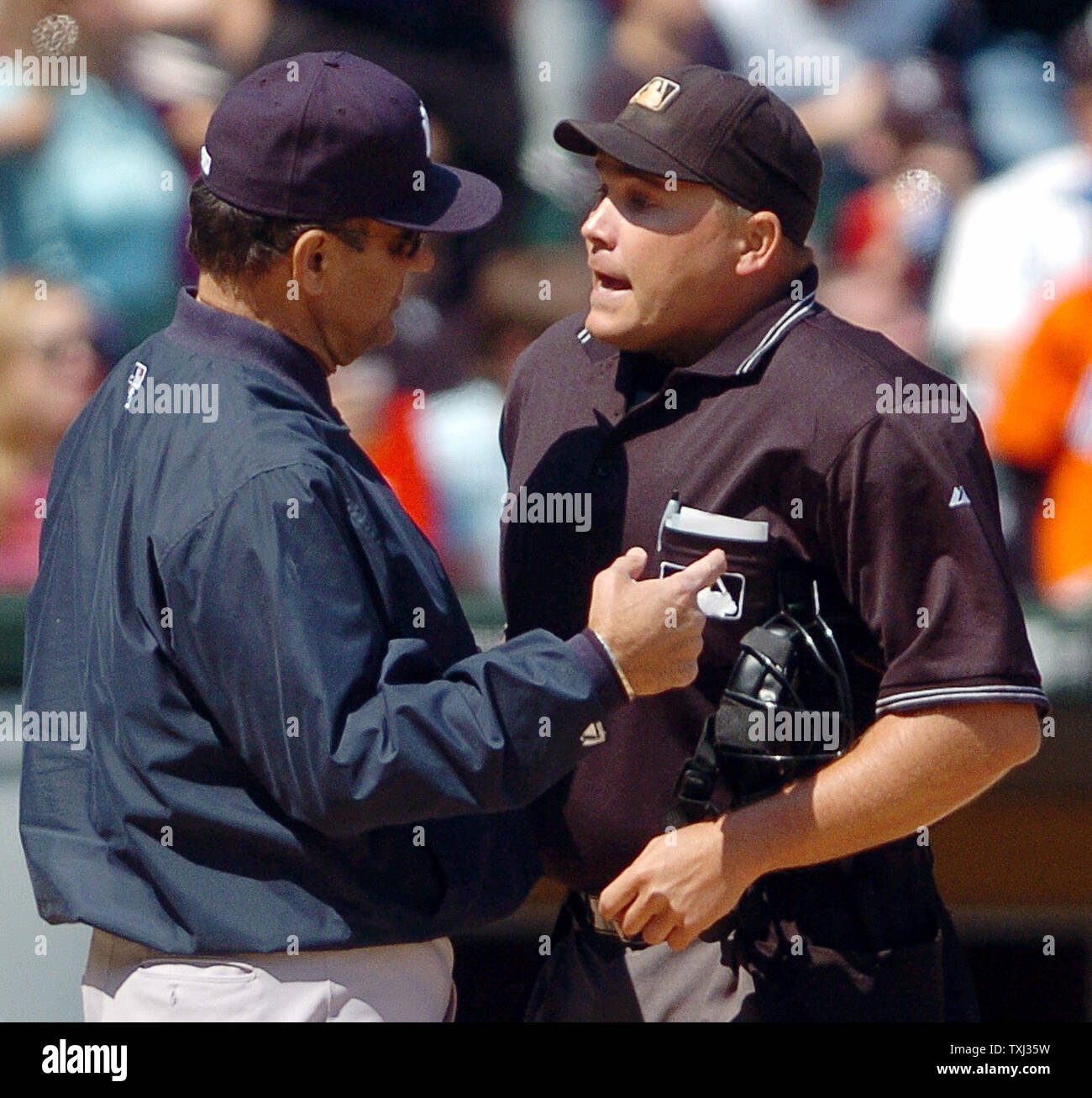 New York Yankees manager Joe Torrei (L) argues with home plate umpire ...