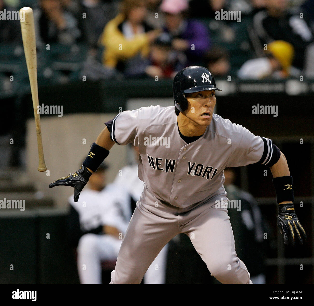 New York Yankees Hideki Matsui of Japan tosses his bat after hitting a ...