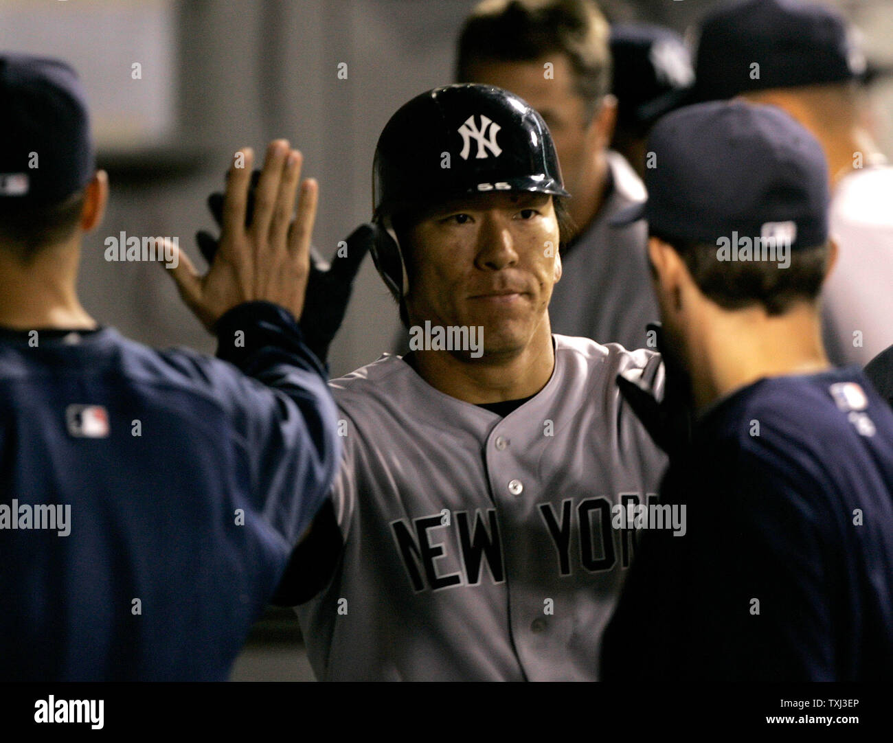 New York Yankees' Hideki Matsui of Japan walks through the dugout after ...