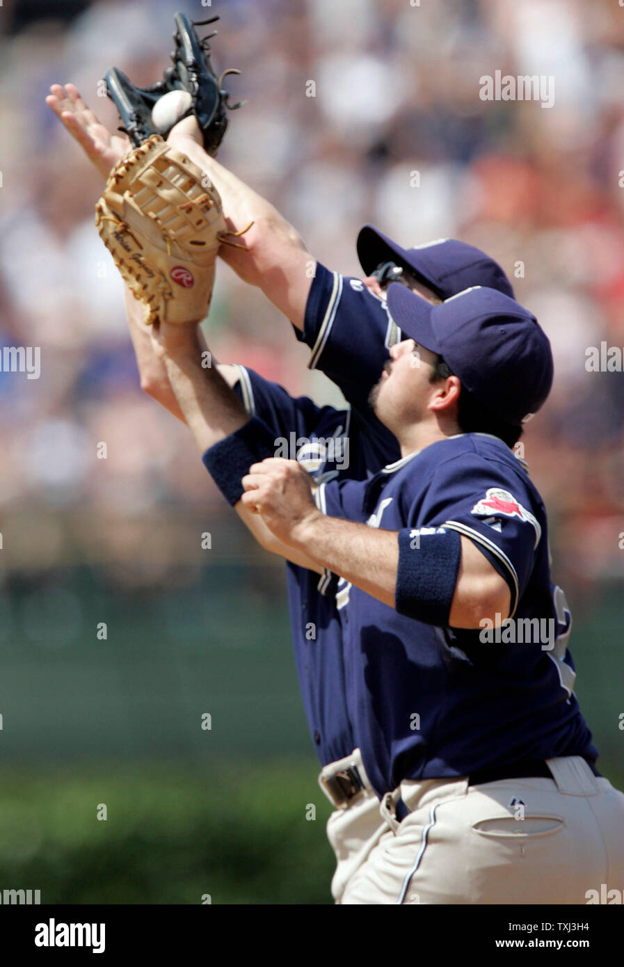 San Diego Padres first baseman Adrian Gonzales (R) and second baseman ...