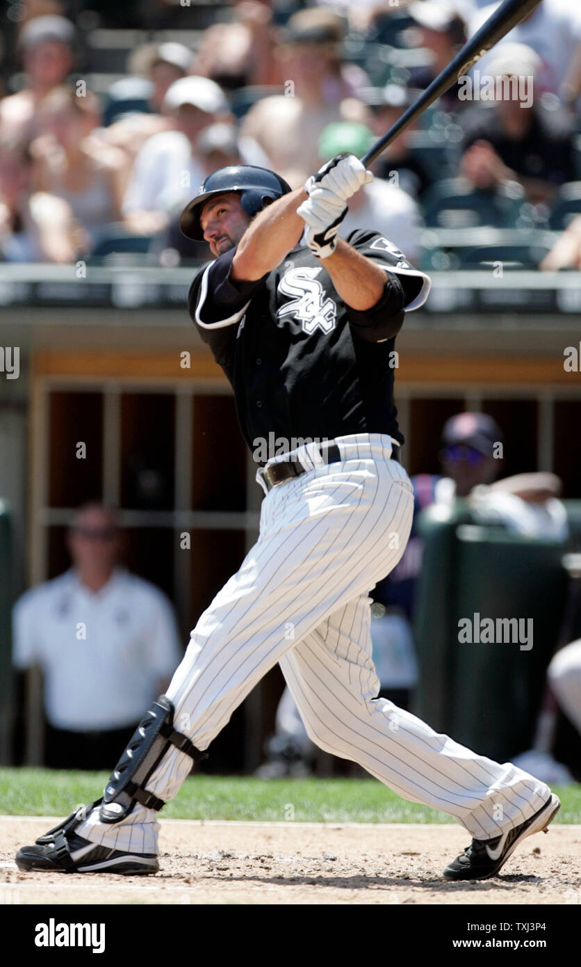 Chicago White Sox first baseman Paul Konerko hits a solo home run off ...