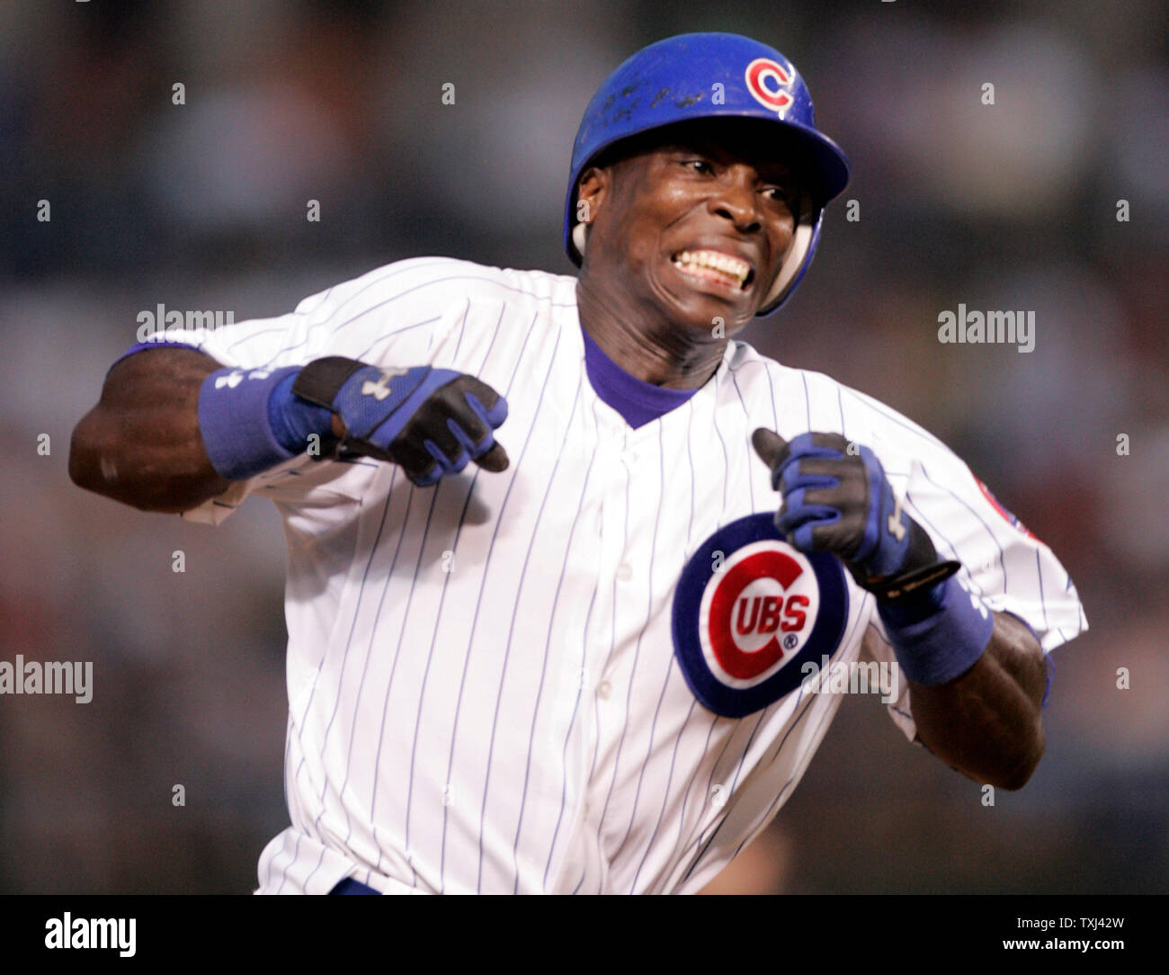 Rounding third base hi-res stock photography and images - Alamy