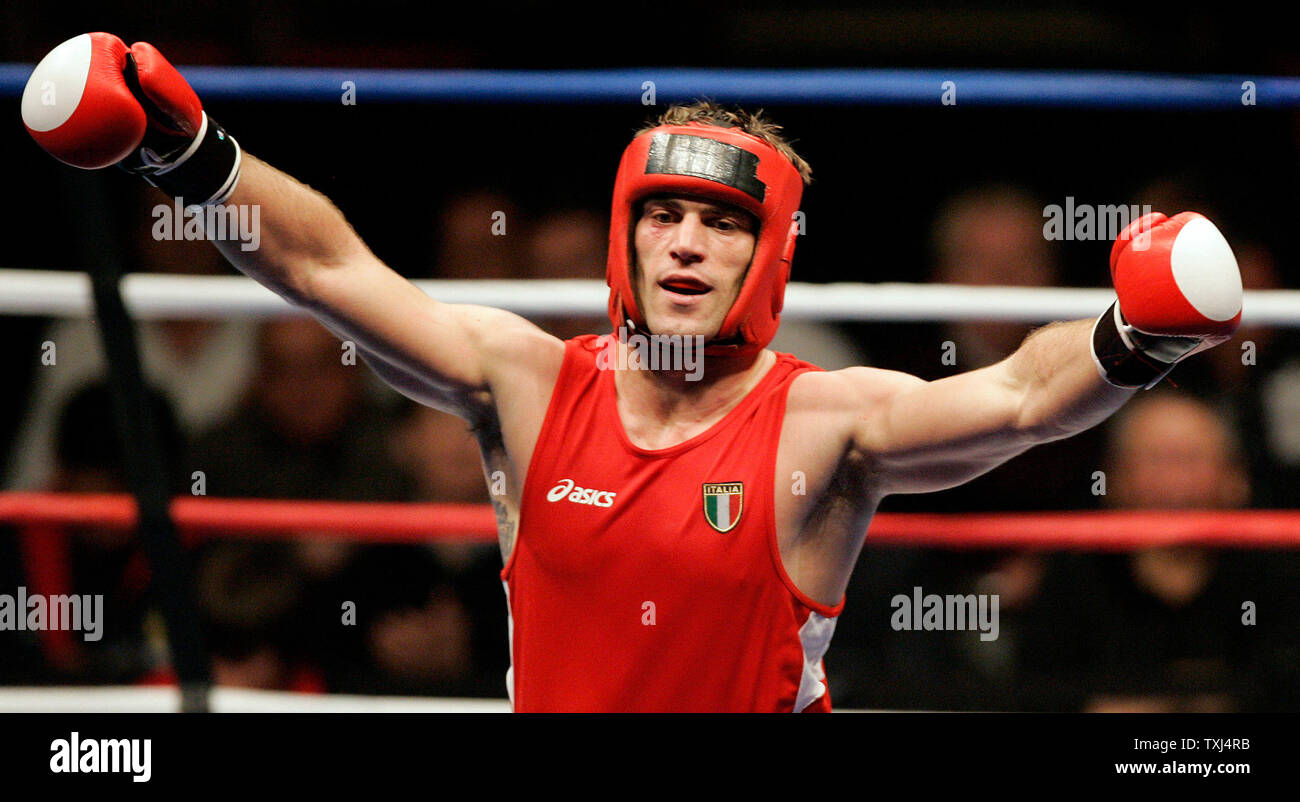 Italy's Clemente Russo celebrates after defeating China's Nijiati ...