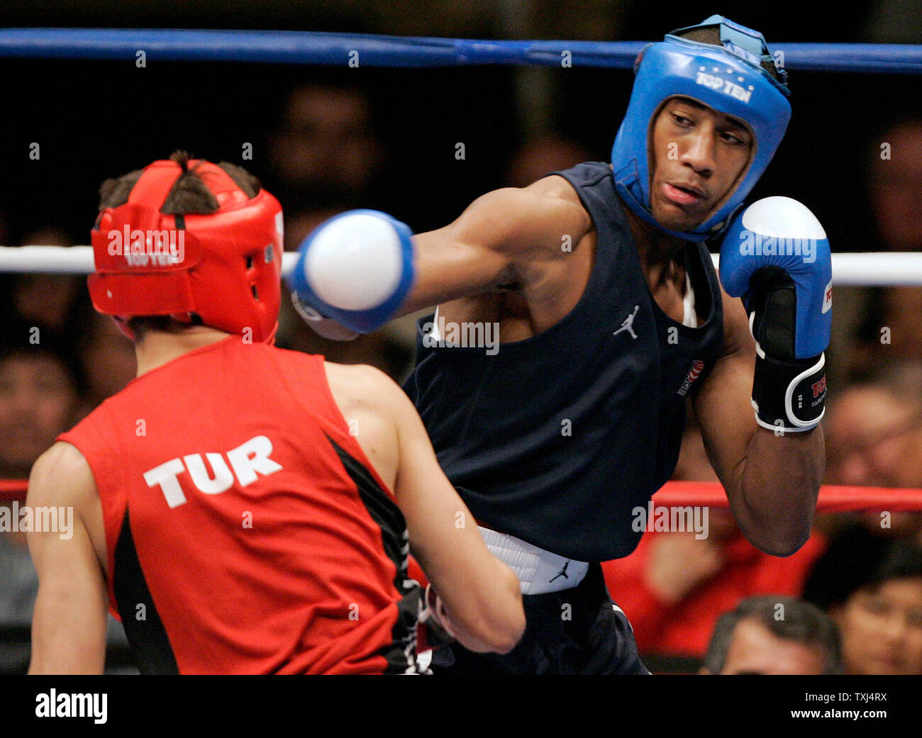Demetrius Andrade of the USA, right, jabs at Adem Kilicci of Turky ...
