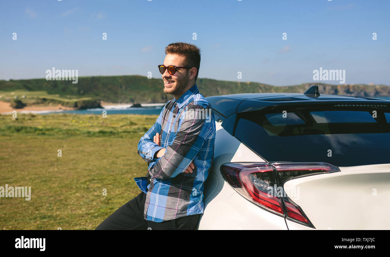 Person leaning on car hi-res stock photography and images - Alamy