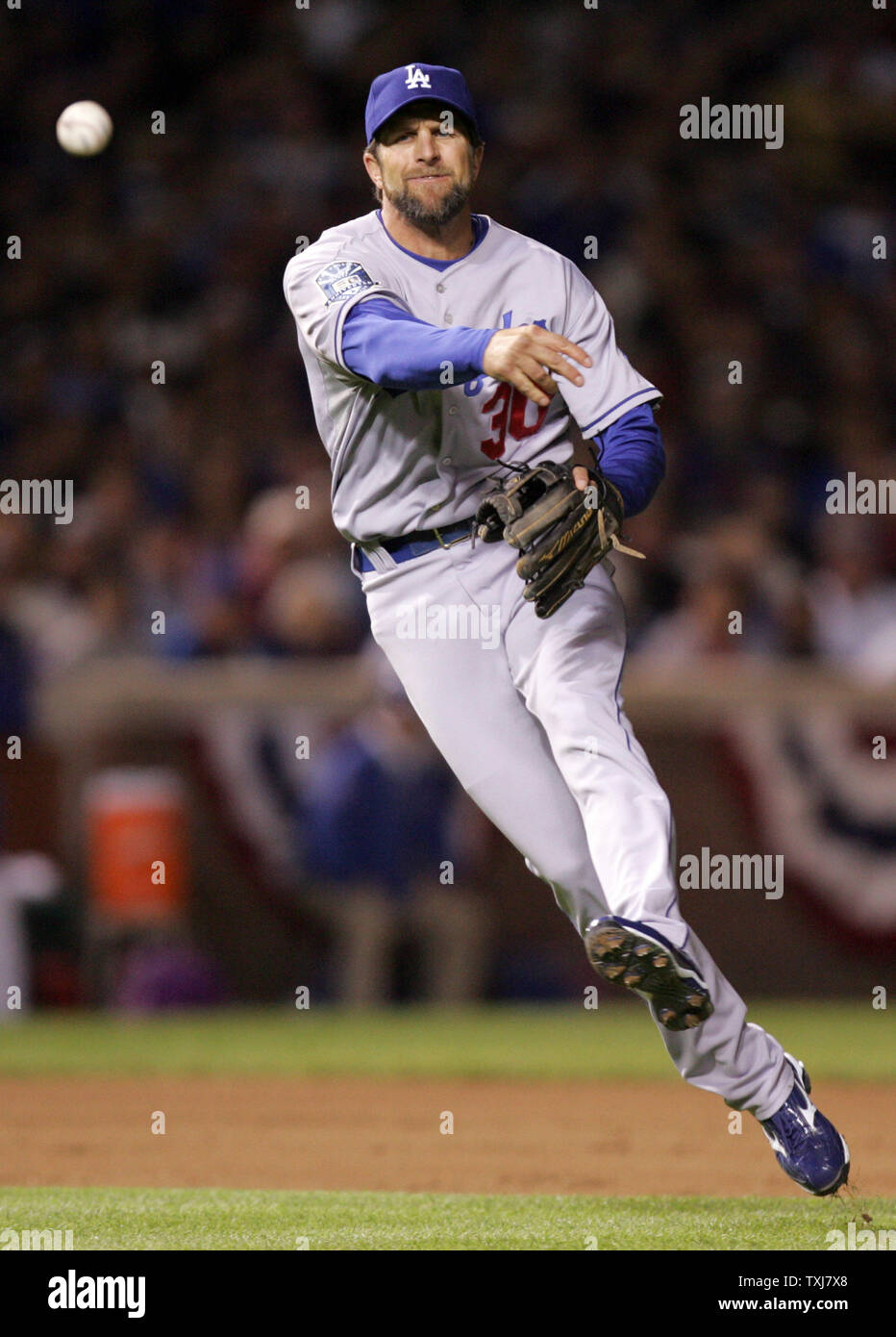 Los Angeles Dodgers third baseman Casey Blake throws out Chicago Cubs ...