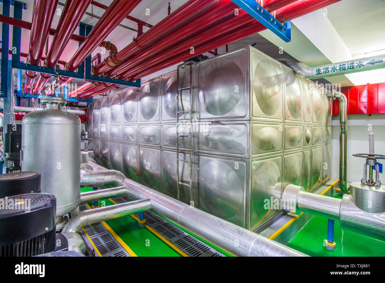 Pressurized water pump room Stock Photo - Alamy