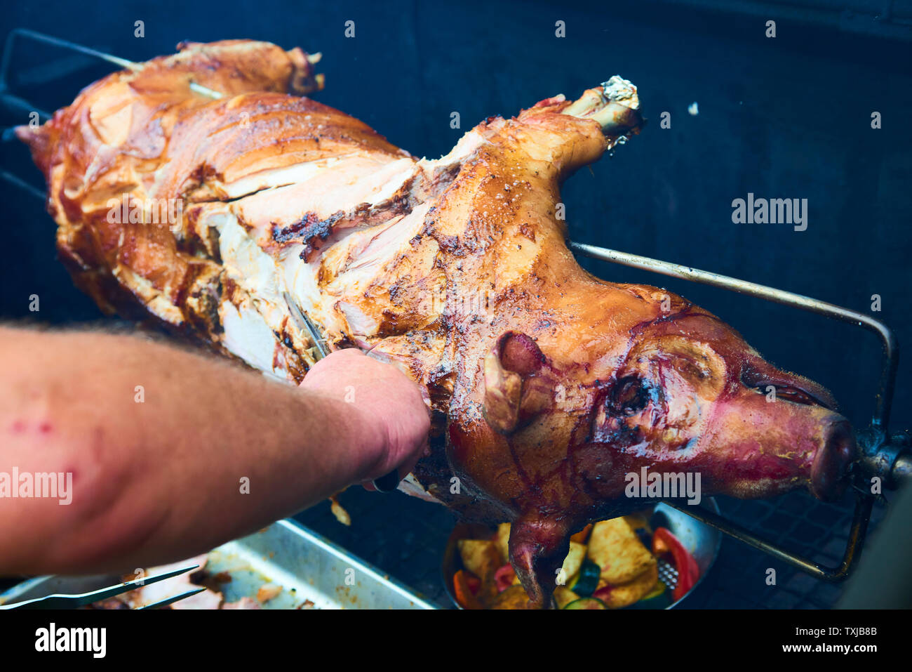 Pig pork cutting party barbecue hi-res stock photography and images - Alamy