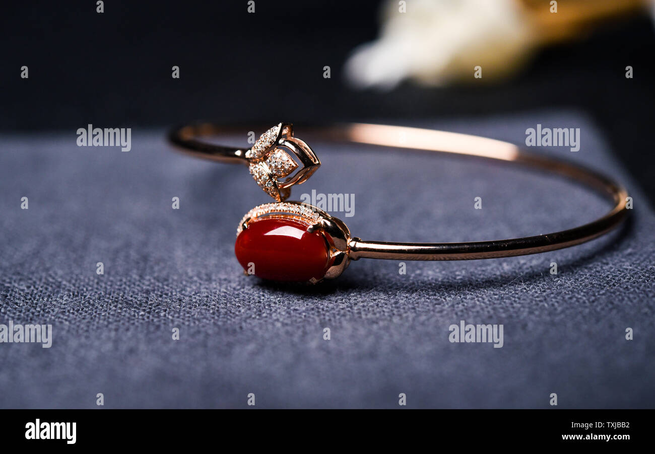 Red coral bracelets hi-res stock photography and images - Alamy