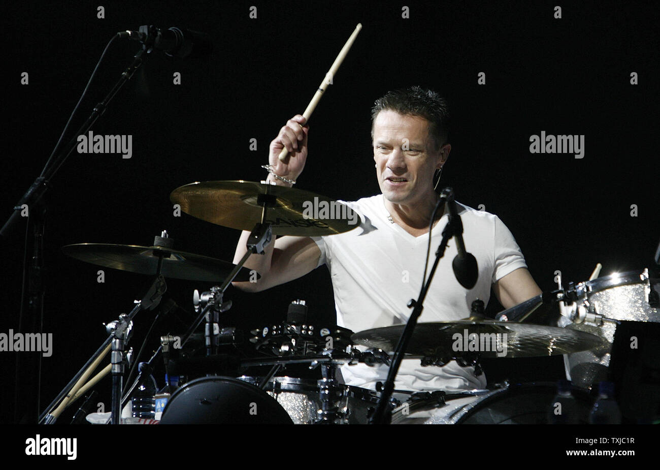 Larry Mullen Jr. of U2 performs during the first concert of their 360 ...