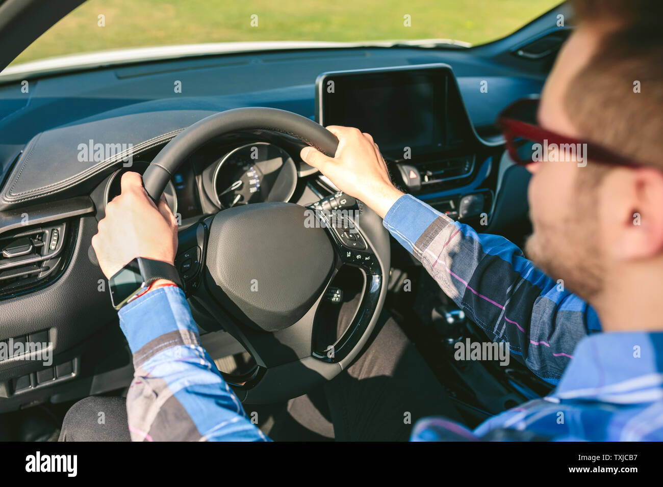 Man steering wheel hi-res stock photography and images - Alamy